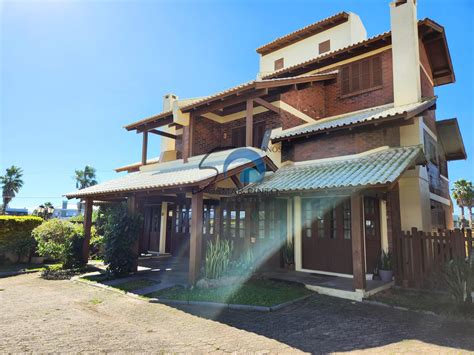 Casa à venda em Torres RS 4 dormitórios 1 suíte 3 banheiros Osmar