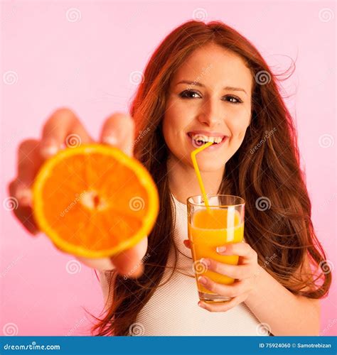 Woman Drinking Orange Juice Smiling Showing Oranges Young Beaut Stock