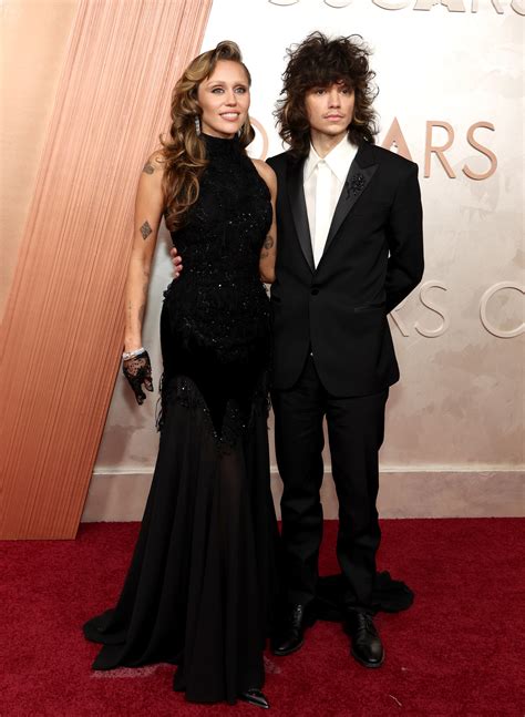 Miley Cyrus Embraces Romantic Gothicism In McQueen Gown At Oscars 2025