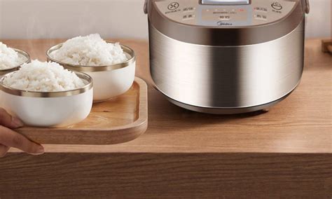 Midea 美的电饭煲MB WFD4016电饭锅家用智能预约4L黄晶蜂窝柴火饭 阿里巴巴