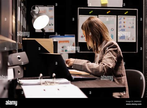 Police Officer Solving Criminal Case Analyzing Crime Scene Evidence