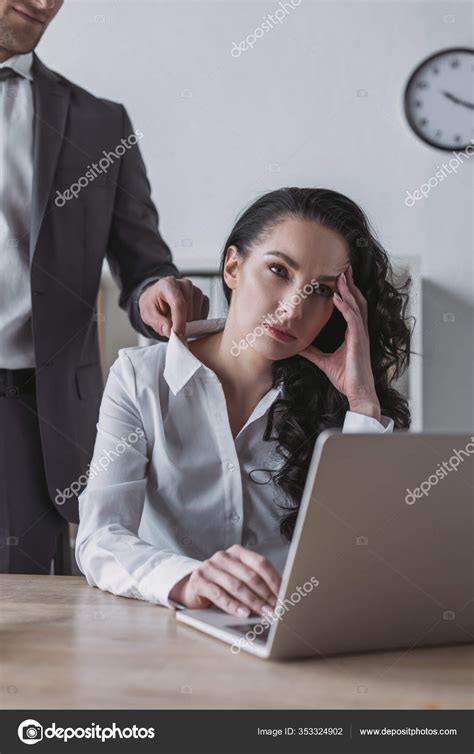 Cropped View Businessman Touching Blouse Bored Secretary Sitting