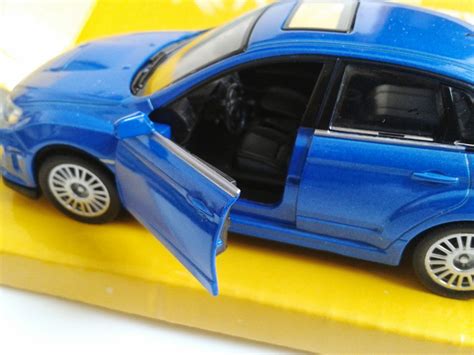 GRAHA DIECAST: Diecast RMZ City/UNI-CAR 1:32