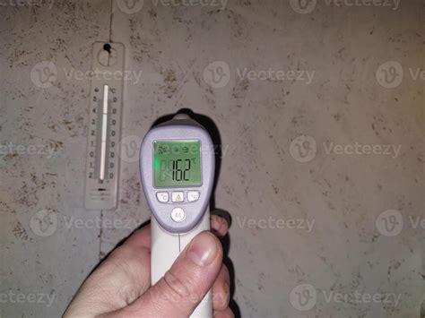 Surface Measurement With A Non Contact Thermometer Stock Photo At Vecteezy
