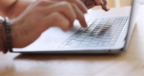Man With Laptop Writing Email Social Media Or Blog Post Young Guy