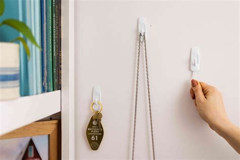 How To Remove Command Strips And Hooks