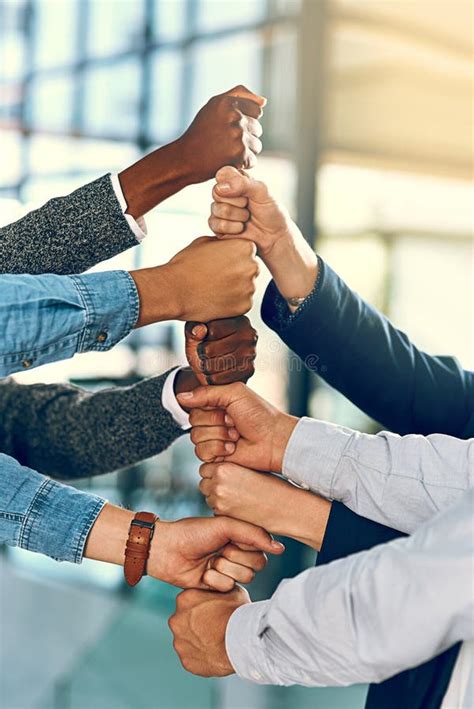 Building A Solid Support Structure A Group Of Unrecognizable