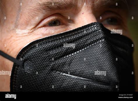 Woman Wears An N95 Face Mask Of The Type In Common Usage Due To Attempts To Control The Spread
