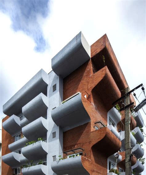 Curving Balconies Double As Environmental Filters At Housing Complex In