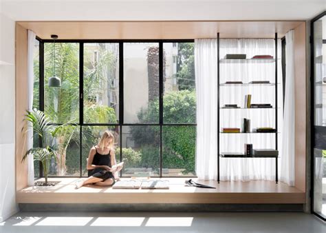 Thin Black Frames Draw The Eye Around A Renovated Tel Aviv Apartment