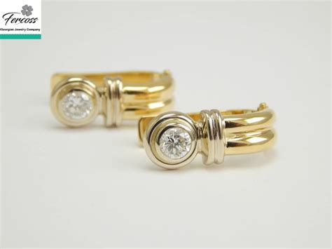 Fercoss Earrings Gold 18k 9gr 2 Diamonds 0 6ct საყურე ოქრო 750