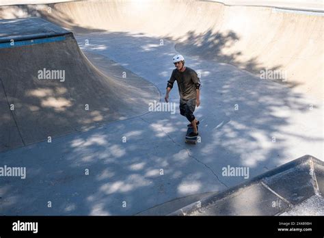 54 Year Old Brazilian Skateboarder Having Fun At A Skate Park On A