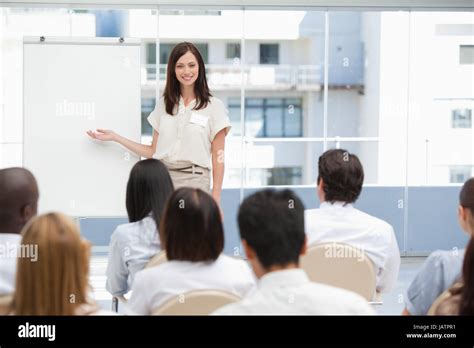 Businesswoman Using A Chart During A Presentation Stock Photo Alamy