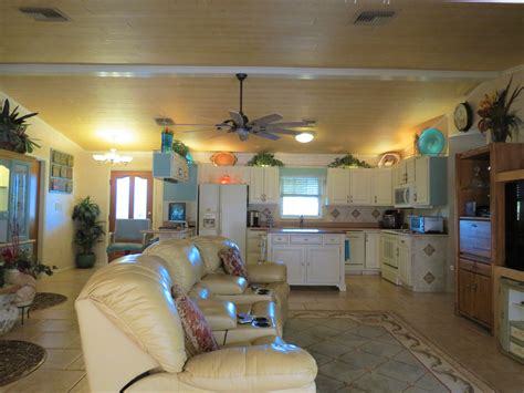 Natural Maple Planks 23 X 23 Cathedral Ceiling Living Room Photo