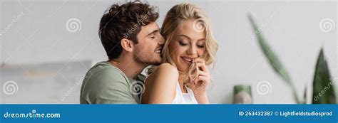 Positive Man In Pajama Kissing Young Stock Image Image Of Blonde