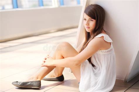 Cute Dreaming Girl In White Blouse Sits On Floor Stock Image Image Of