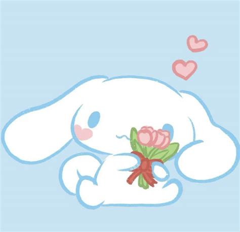 A White Bunny Holding A Bouquet Of Flowers In Its Lap With Hearts