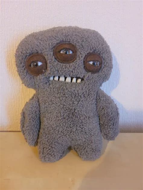 Fuggler Annoyed Alien 3 Eyed Plush Brown Cuddly Toy Funny Ugly Monsters