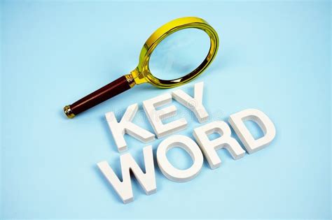 Keyword Word With Magnifying Glass Top View On Blue Background Stock Image Image Of Wooden
