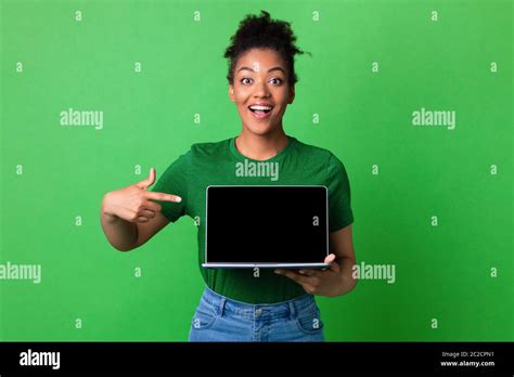 Girl Showing Black Blank Personal Computer Screen Stock Photo Alamy
