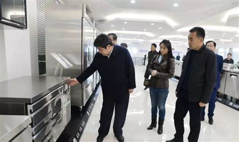 市委常委统战部部长李家良陪同客人到滨州市 滨州市美厨厨业有限公司