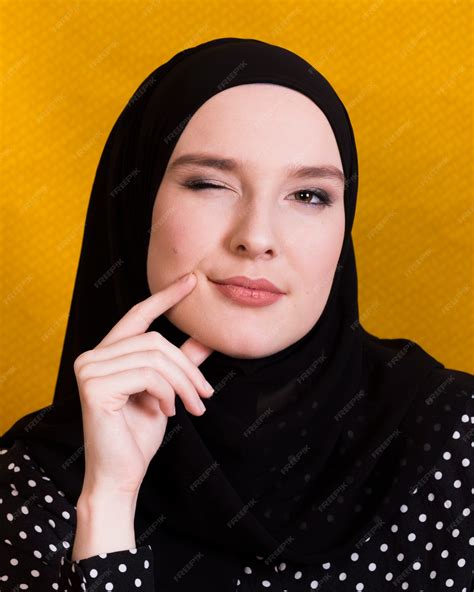 Premium Photo Attractive Young Woman Blinking Her Eye While Thinking