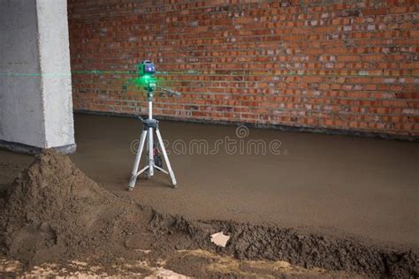 Precision Layout Performed Using Green Laser Lines On Construction Site
