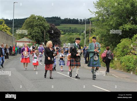 Pipe And Drums Bands Street Parade Pipers And Drummers Playing And