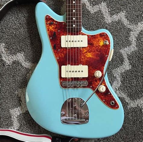 An Electric Guitar Is Laying On The Floor
