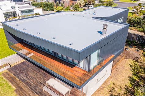 Heat Welded Membrane Roof Offers Trusted Durability For Coastal Home Eboss