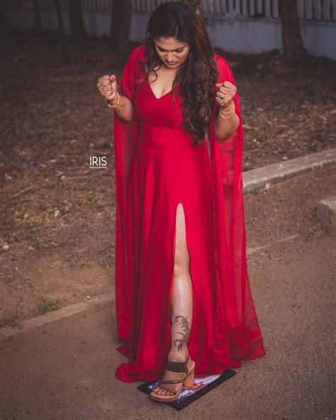 Tamil Actress Shalini Stuns In A Red Thigh High Slit Gown As She