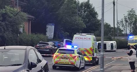 Road Taped Off And Person Taken To Hospital After Car Flips In Crash