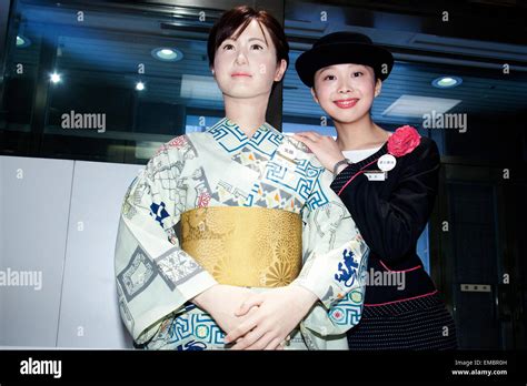 Tokyo Japan 20th April 2015 L To R Robot Aiko Chihira And A Human Receptionist Pose For