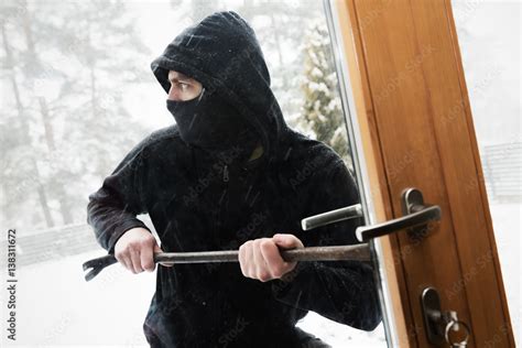 House Robbery Robber Trying Open Door With Crowbar Stock Photo