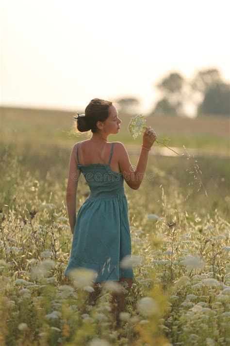 Blond Slavic Ukrainian Girl In A Wheat Field At Sunset Fresh Air
