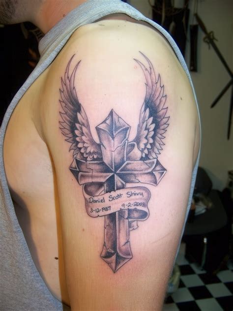 Tattoo Wings And Cross Symbolism Style And Meaning