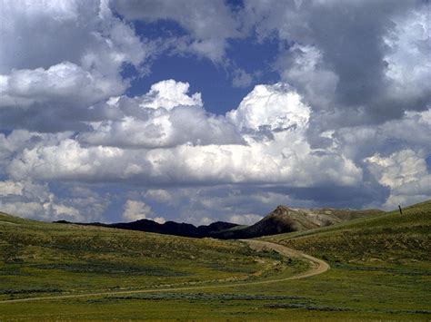 Photo de paysage avec cumulus - Photos Futura