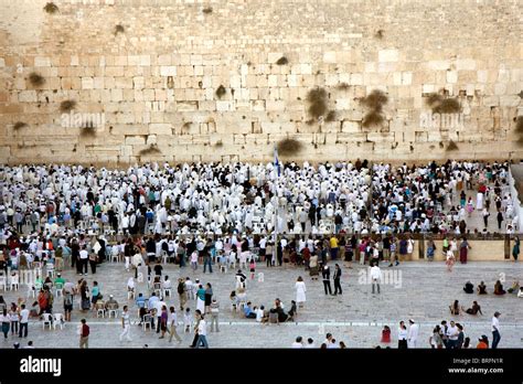 Jewish Religious Man With Traditional Clothes Pray At The Wailing Wall