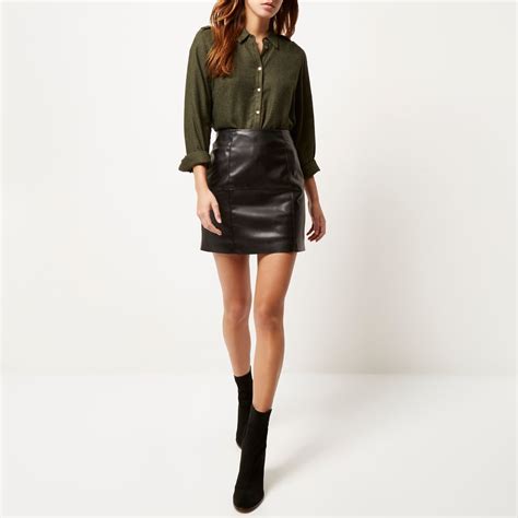 Кожаная юбка с чем носить зимой на корпоратив 90 фото