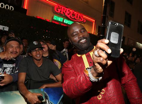 Movie Premiere Mike Colter And Iva Colter Attends Disney And Marvels