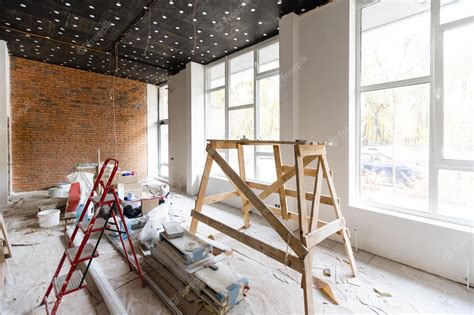 Premium Photo Workers Are Installing Plasterboard For Gypsum Walls In