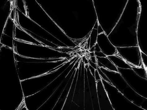 Premium Photo Cracked Glass Texture On Black Background