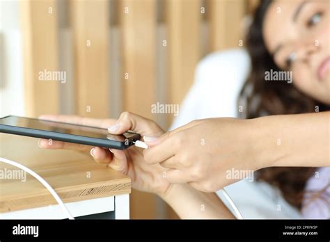Plugging Charger Into Mobile Telephone Hi Res Stock Photography And Images Alamy