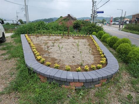 화도면 쓰레기 무단투기 지역에 화단 조성