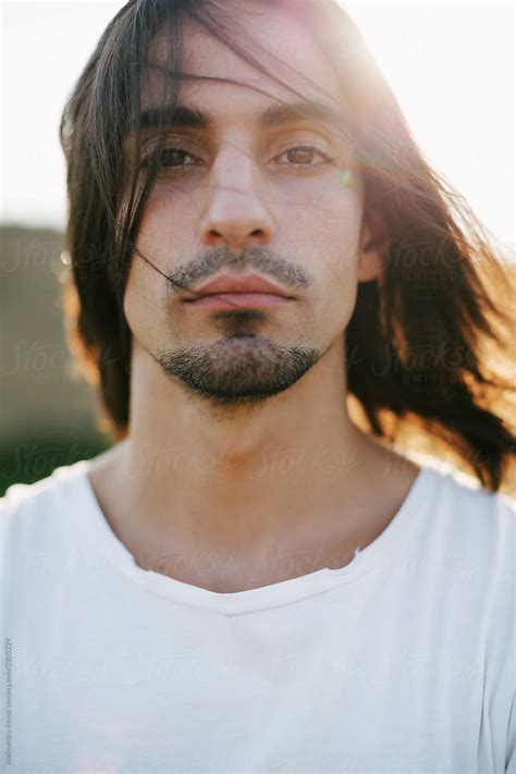 Portrait Of A Man With The Sun In His Hair By Stocksy Contributor