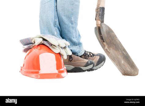 Male Constructor With Work Tool And Safety Equipment In Closeup