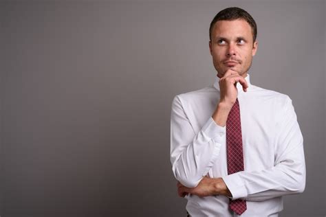 Premium Photo Portrait Of Handsome Businessman On Gray