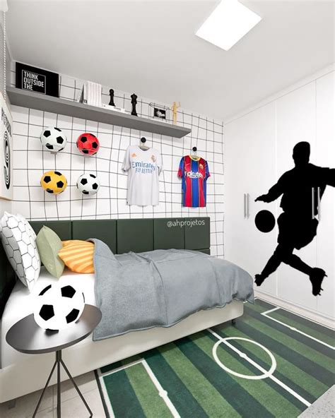 A Bedroom With A Soccer Themed Wall Decal
