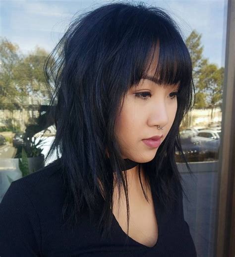 Black Shag With A Wispy Fringe Bangs For Round Face Short Hair With Bangs Long Wavy Hair Long