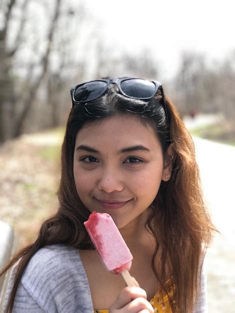 Premium Photo Portrait Of Woman With Ice Cream